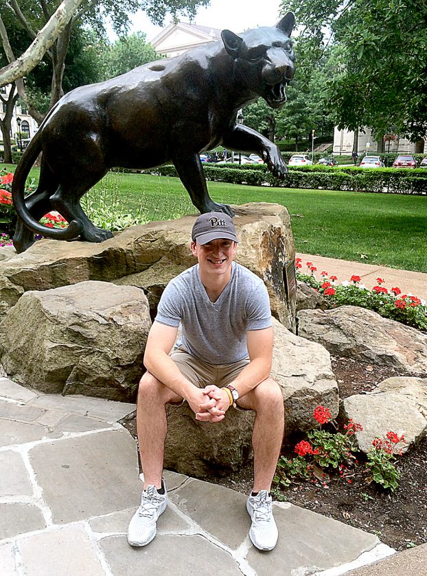 Pandemic puts damper on son’s ceremony… but not on accomplishment ...